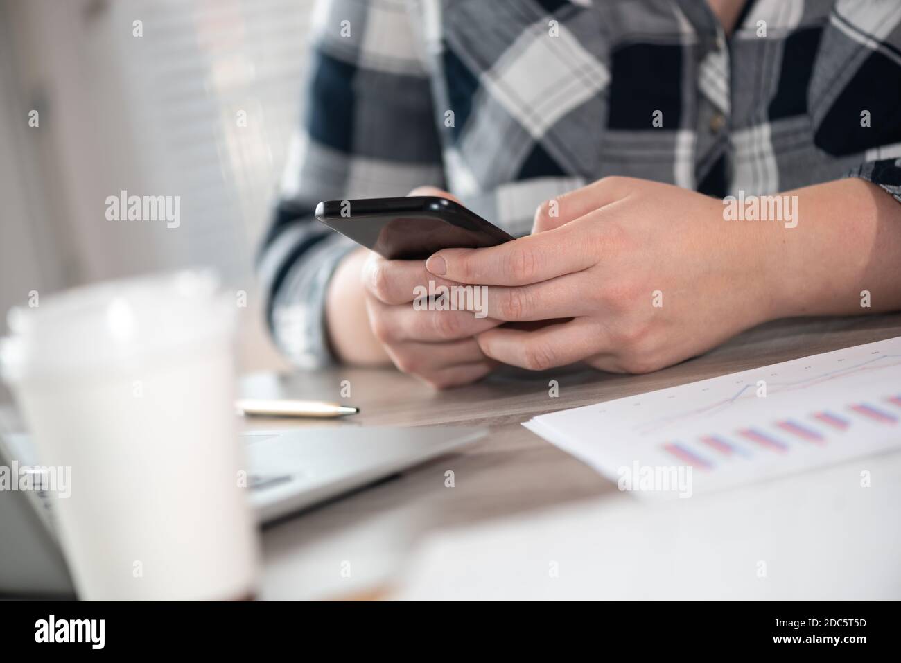 Female hands using a mobile phone Stock Photo - Alamy