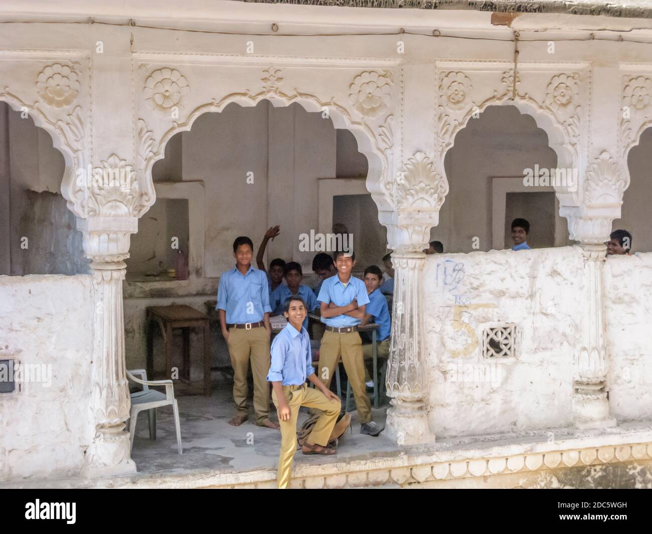 India, Rajasthan, Jodhpur. School boys in the classroom of unused Maha ...