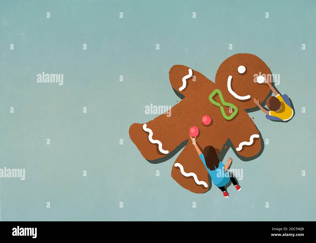 Boy and girl assembling gingerbread man Stock Photo - Alamy