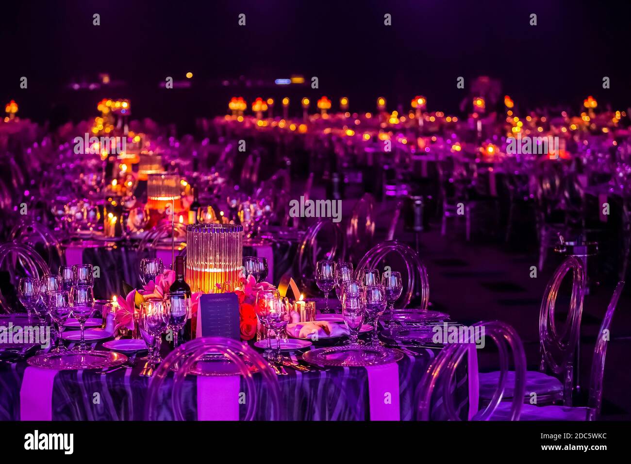 A gala dinner preparation, tables decorated with candles Stock Photo ...