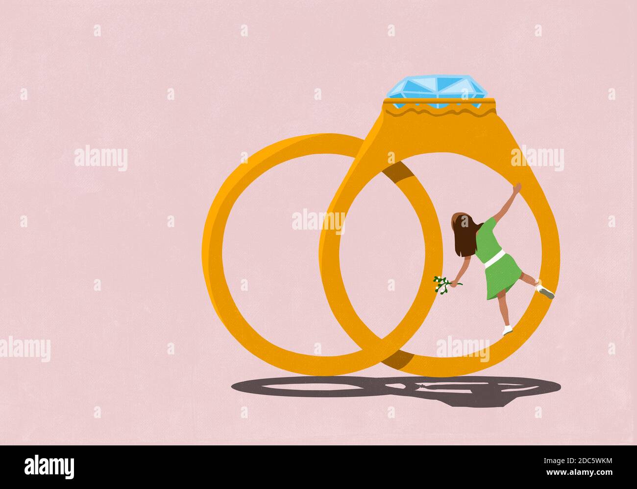 Happy young woman hanging from engagement ring Stock Photo - Alamy