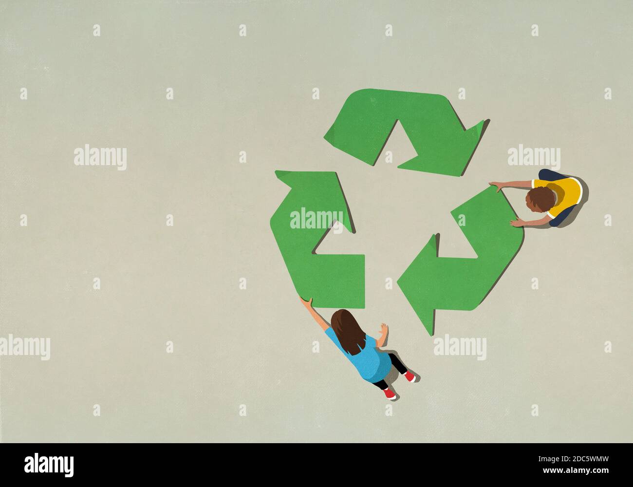 Boy and girl assembling green recycling symbol Stock Photo - Alamy