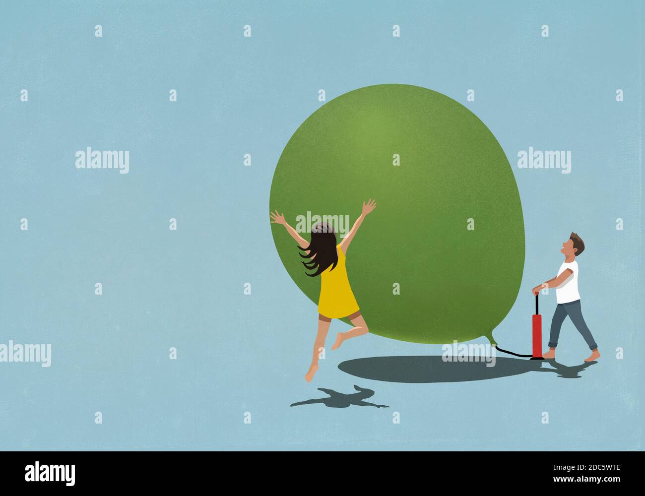 Happy man and woman inflating large balloon Stock Photo - Alamy