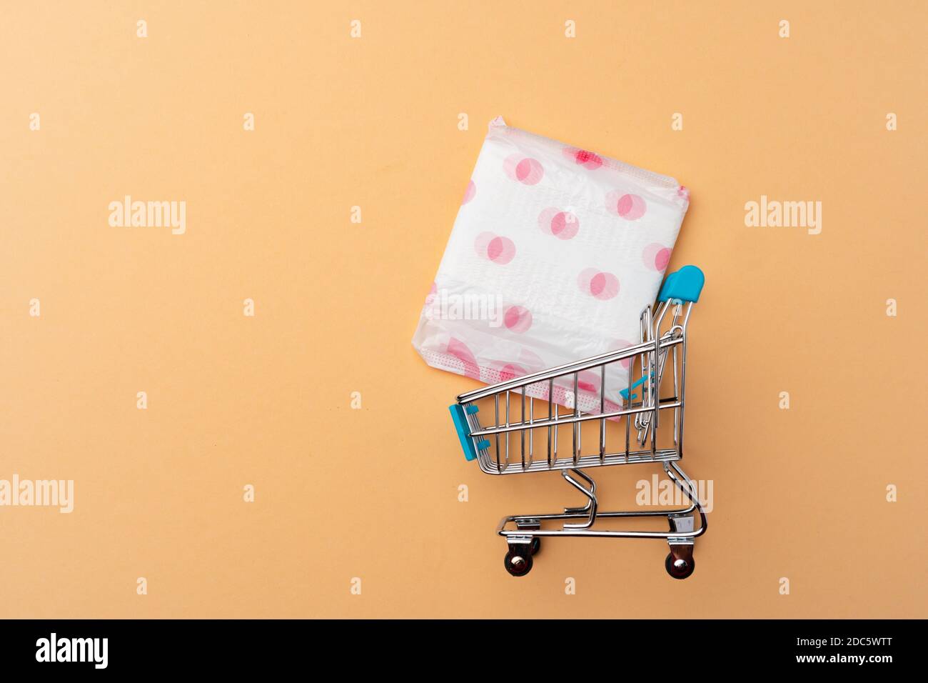 Shopping cart with female pads close up Stock Photo - Alamy