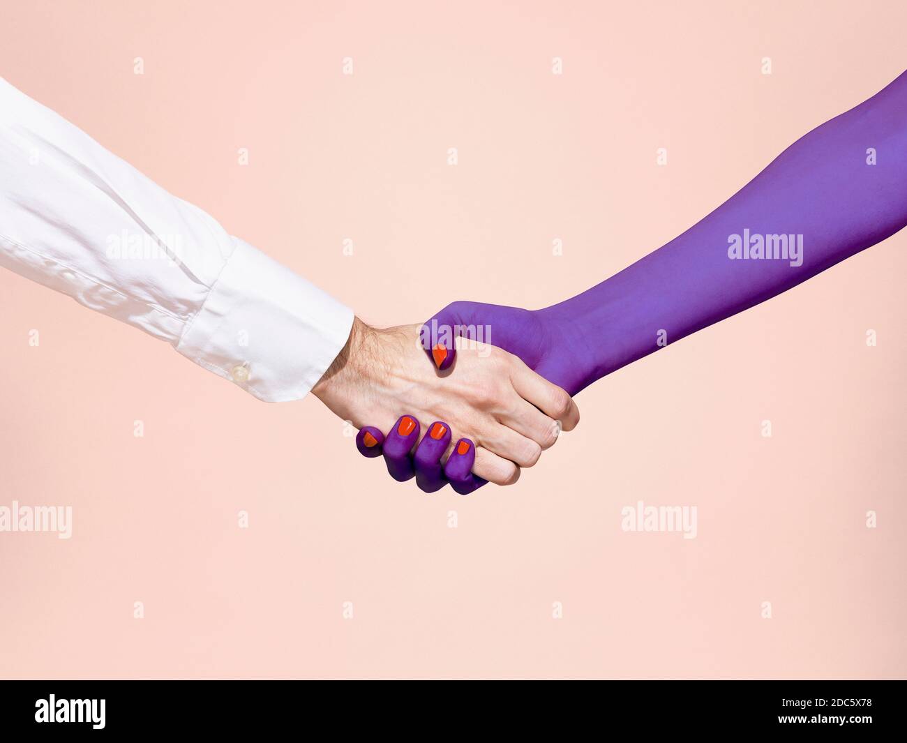 Abstract handshake on pink background Stock Photo - Alamy