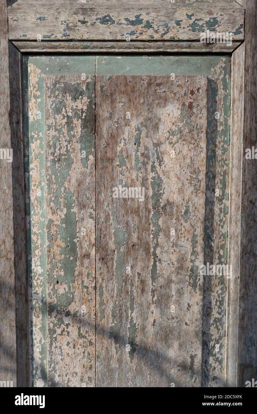 A vertical shot of a weathered wooden door Stock Photo - Alamy