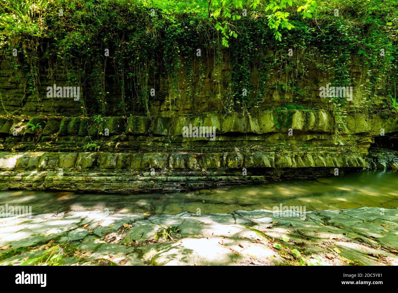 Textures of various stone layers in mountain river Stock Photo - Alamy