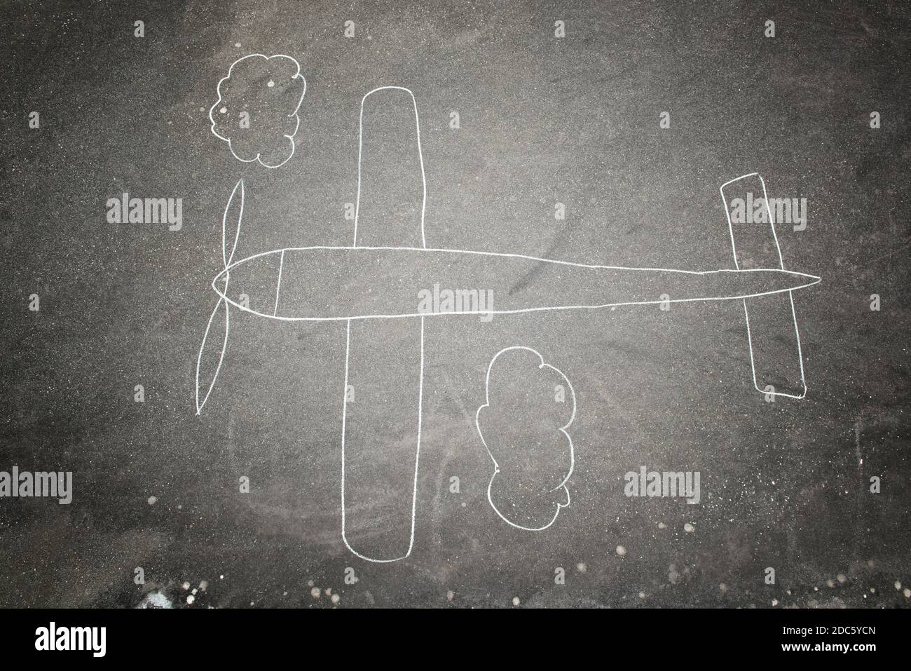Plane drawn with chalk by kids on the street Stock Photo - Alamy