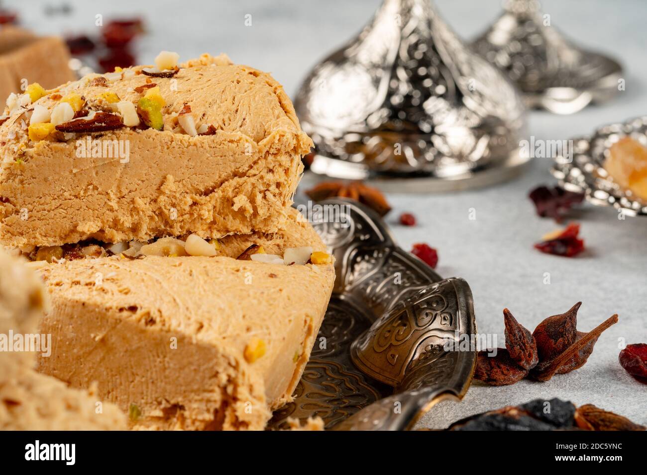 Close up photo of halva dessert on silver plate Stock Photo - Alamy