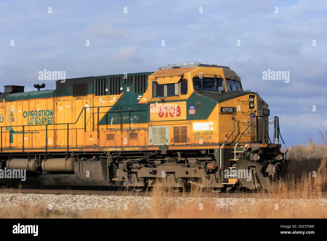 Union Pacific Train shot closeup going down the track in the country ...