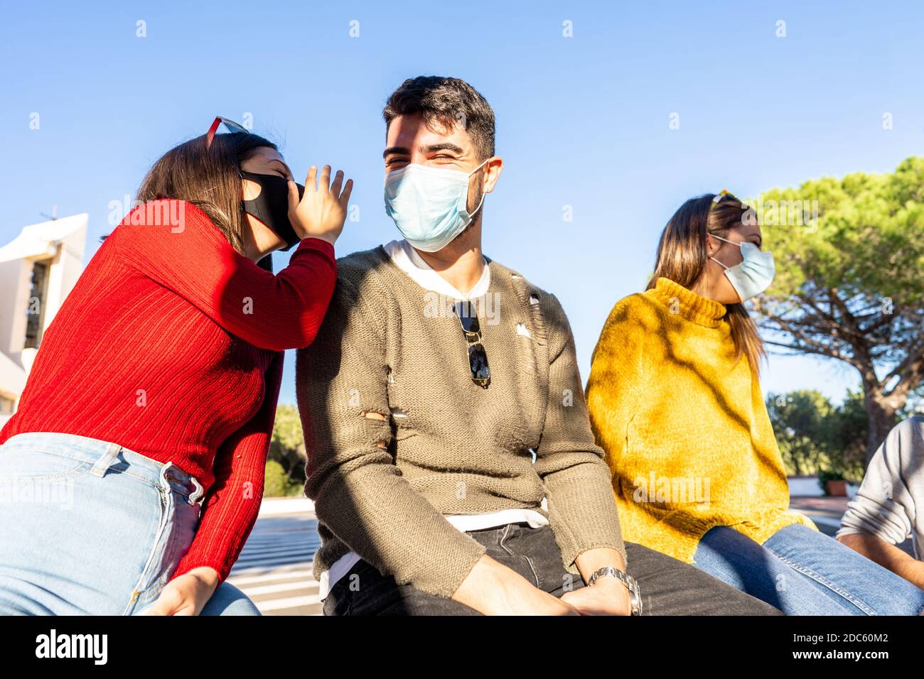 Speak in the ear hi-res stock photography and images - Alamy