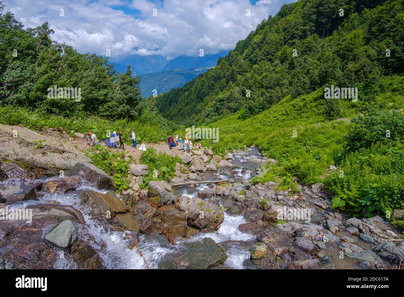 Rosa Khutor. Russia. July 28, 2019. People visit waterfalls in the ...