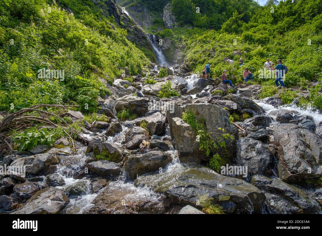 Rosa Khutor. Russia. July 28, 2019. People visit waterfalls in the ...