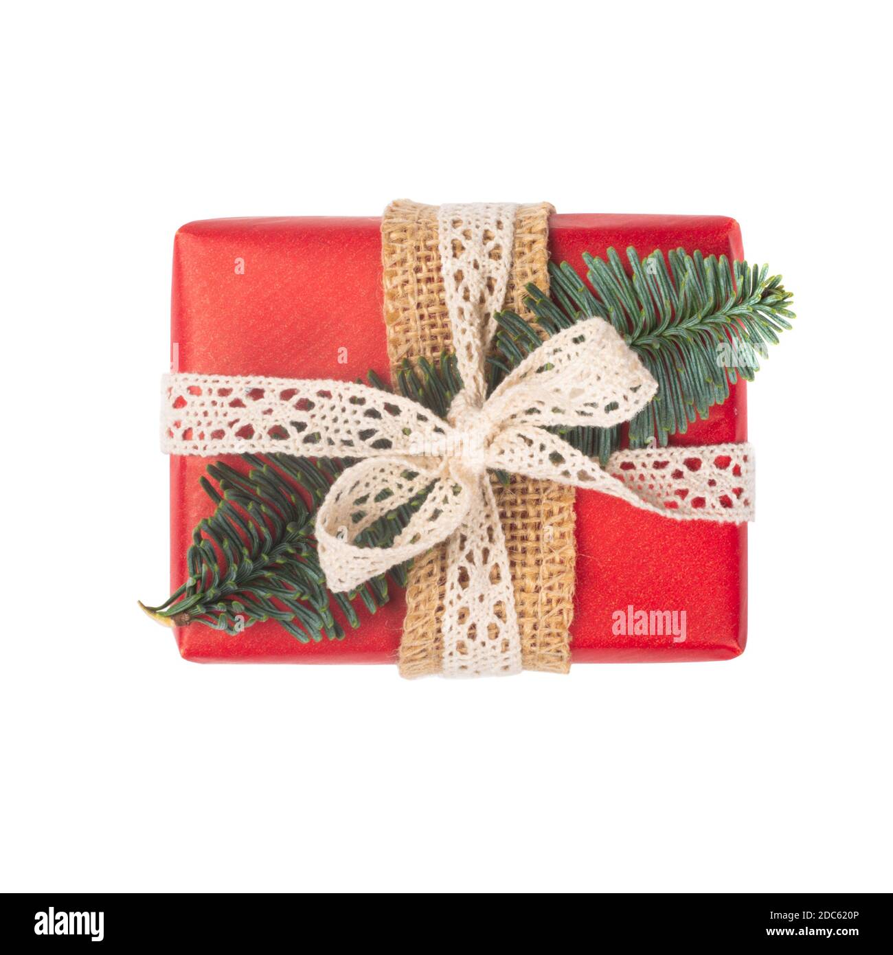 Wrapped vintage christmas gift box with red ribbon bow, isolated on ...