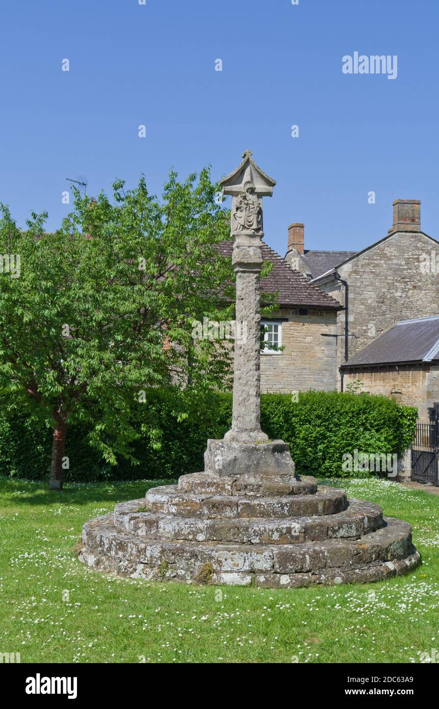 Historic 14th century cross in the church yard of St Mary the Virgin ...
