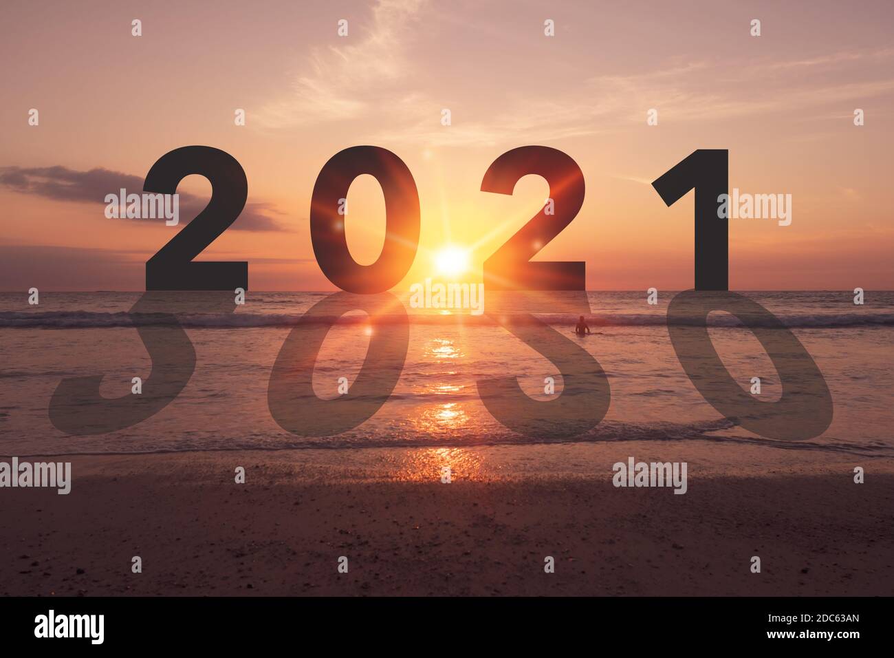 New year 2021 is coming with sunset beach background. New start for ...