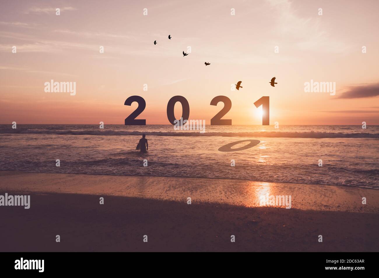 New year 2021 is coming with sunset beach background. New start for ...
