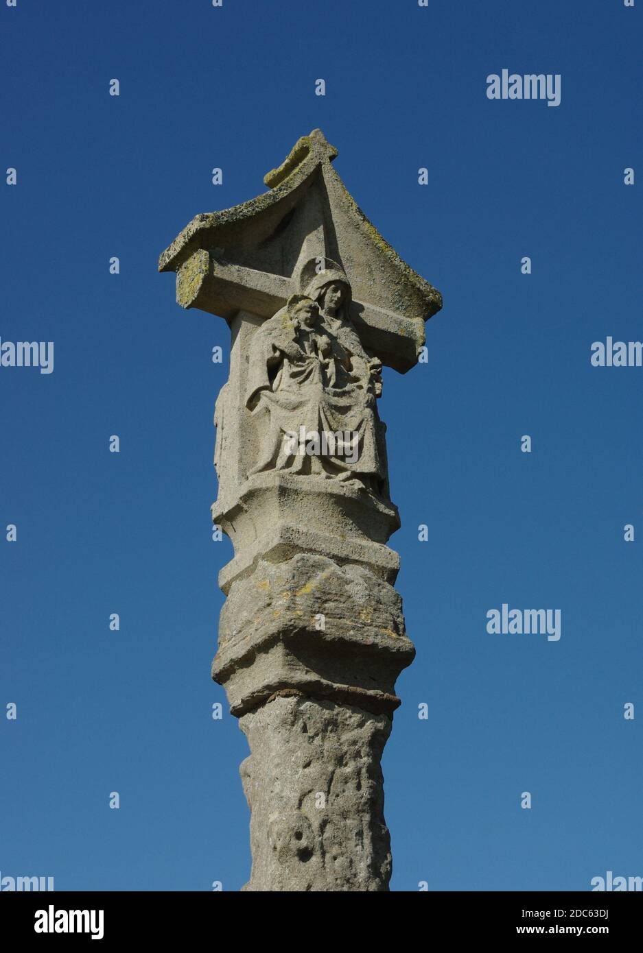 Historic 14th century cross in the church yard of St Mary the Virgin ...