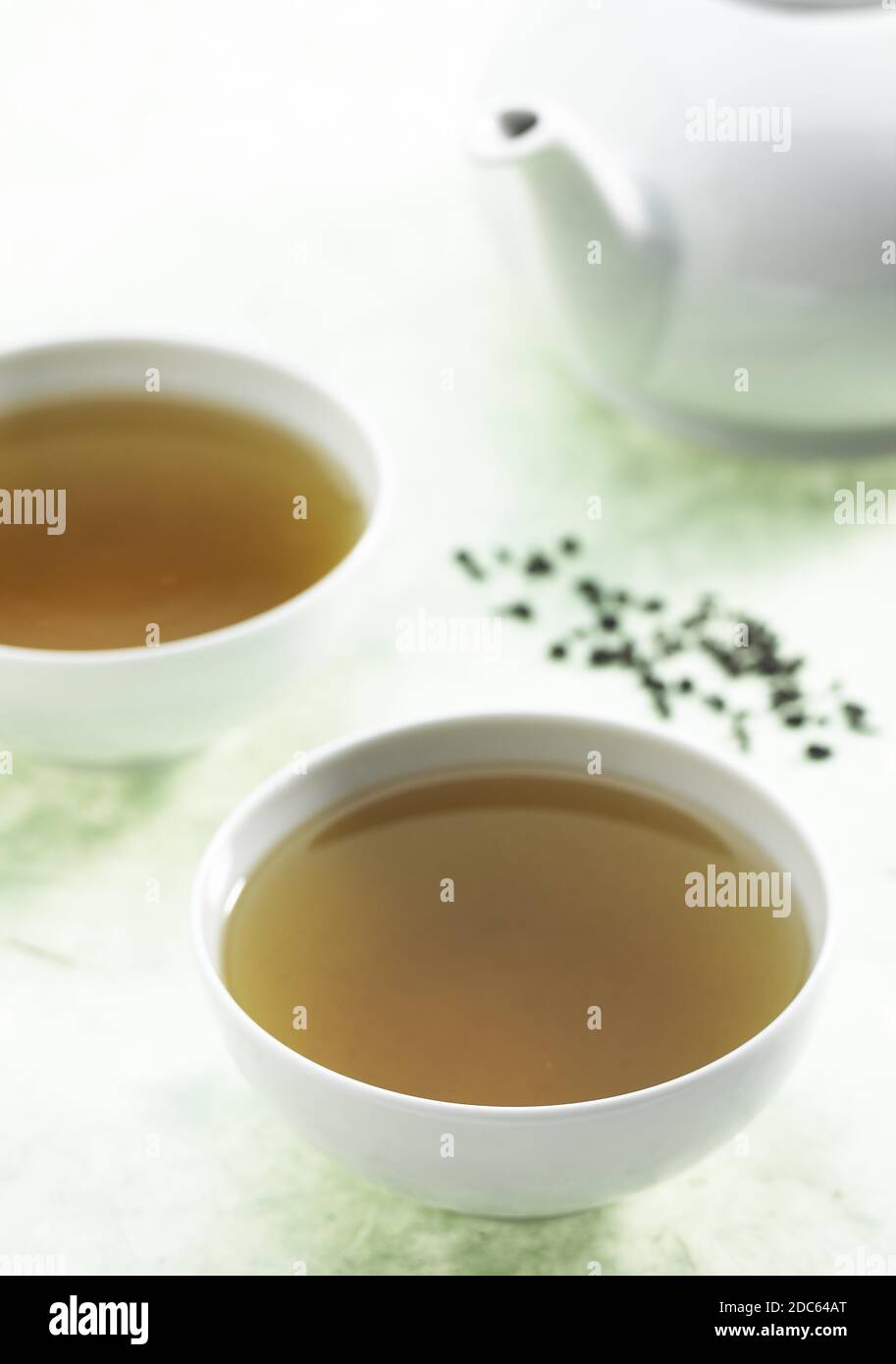 BOWLS WITH INFUSION OF GREEN TEA Stock Photo - Alamy