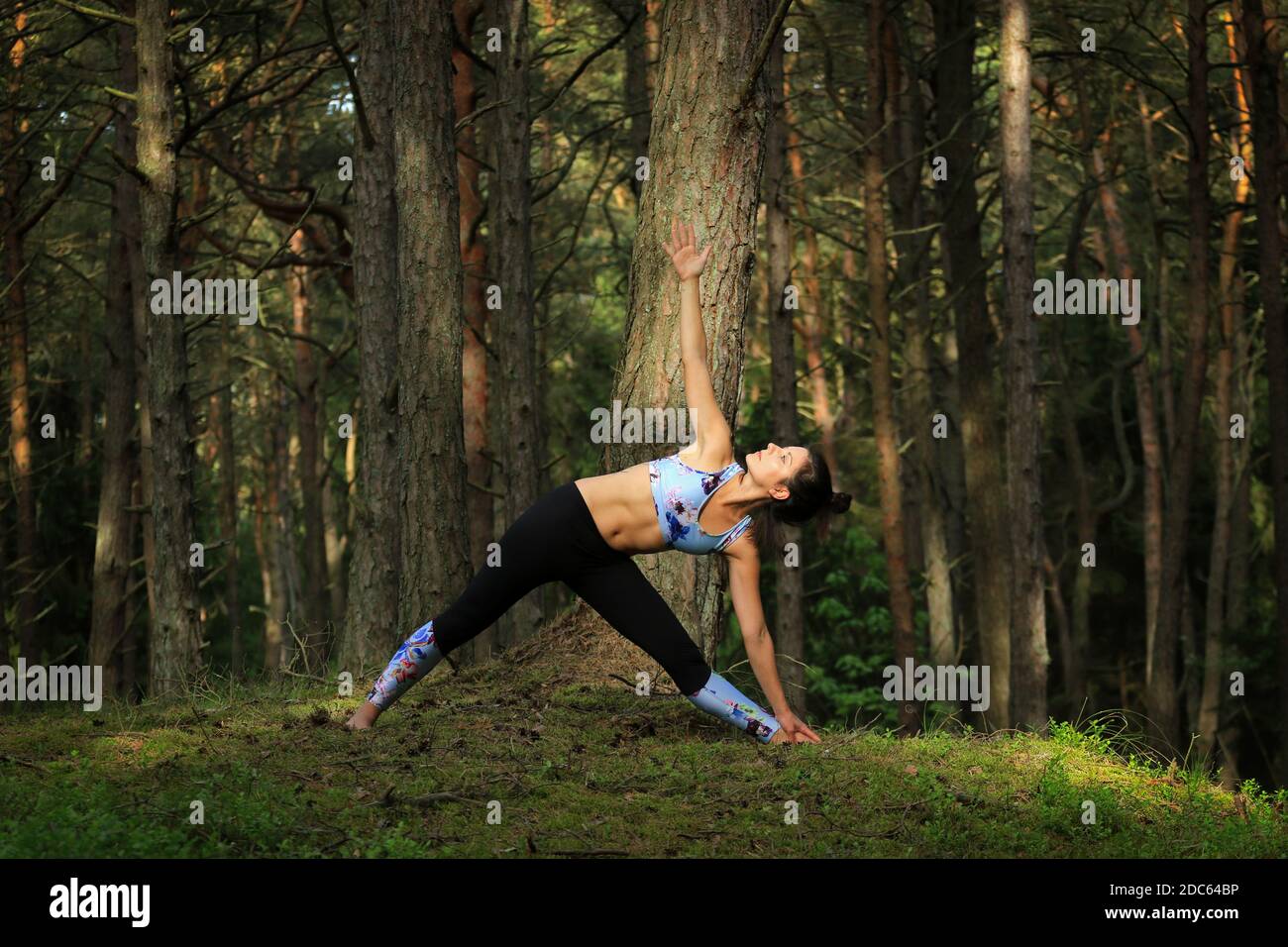 In yoga positions hi-res stock photography and images - Alamy