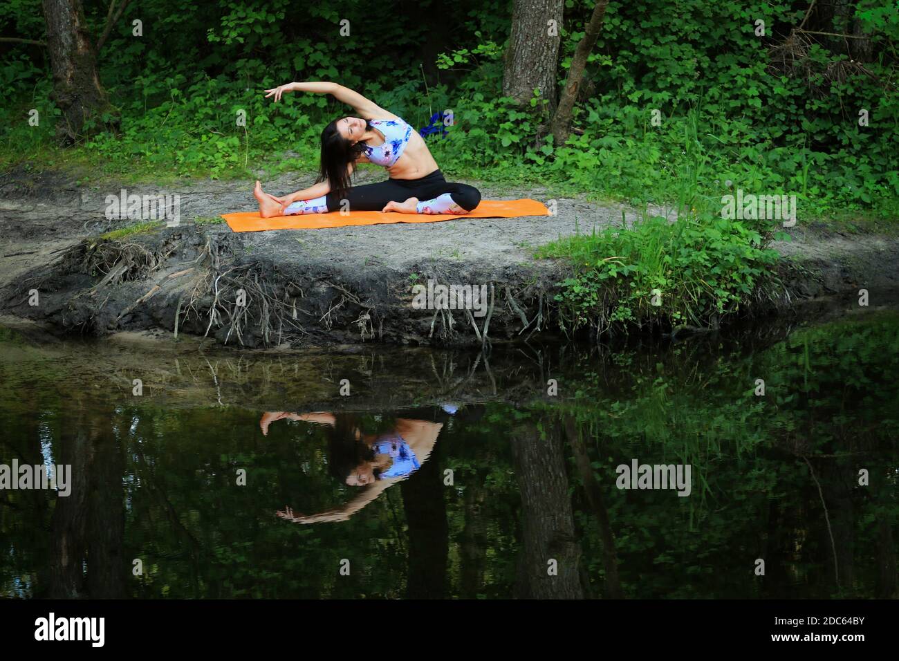 Yoga and meditation in the forest Stock Photo - Alamy