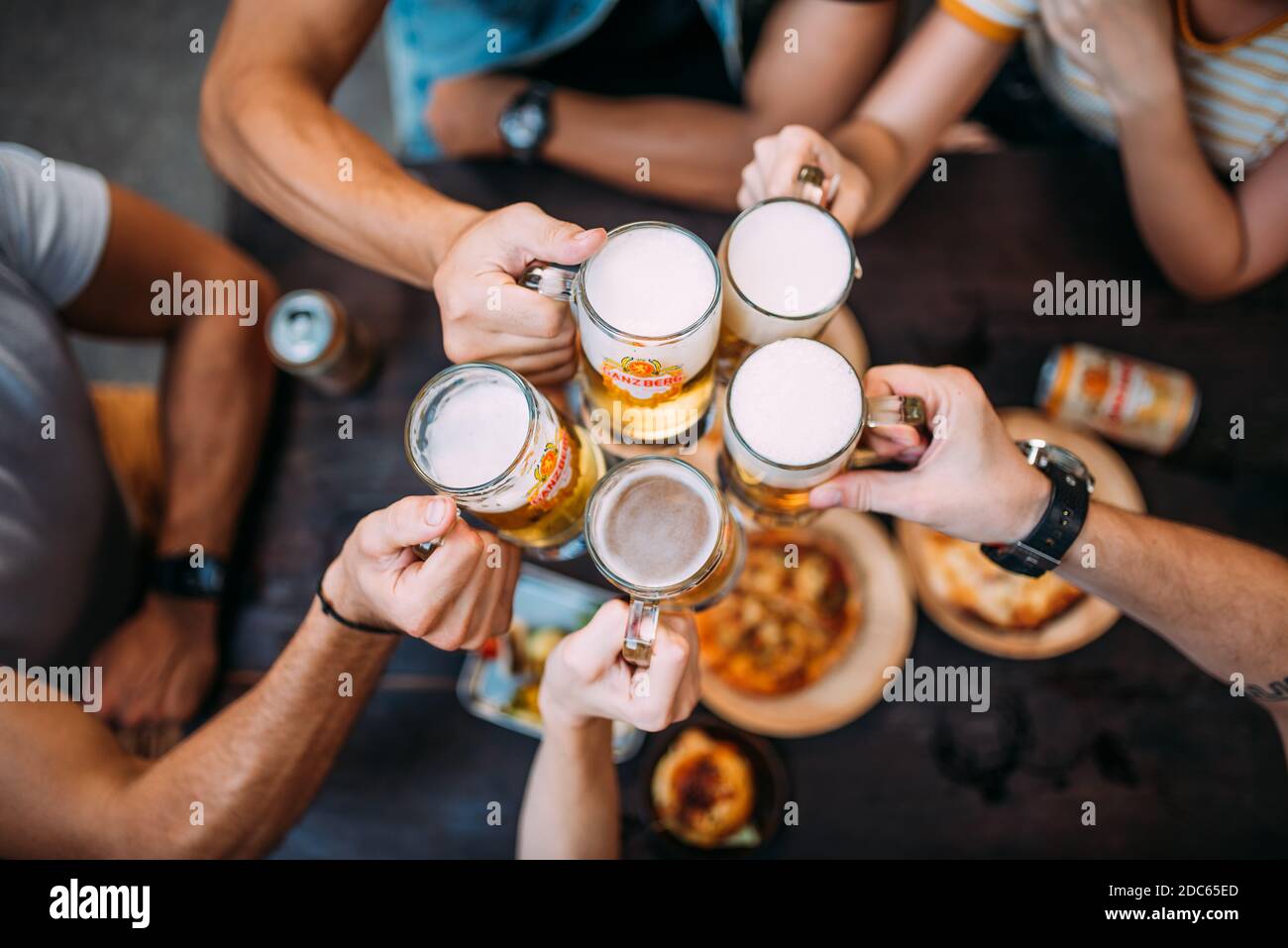 Party beer Happy friends group drinking Ganzberg beer at brewery bar ...