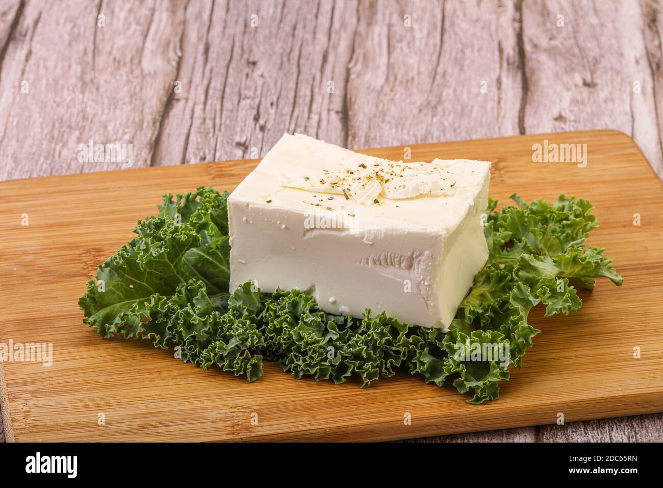 Traditional tasty Greek Feta soft cheese brick Stock Photo - Alamy