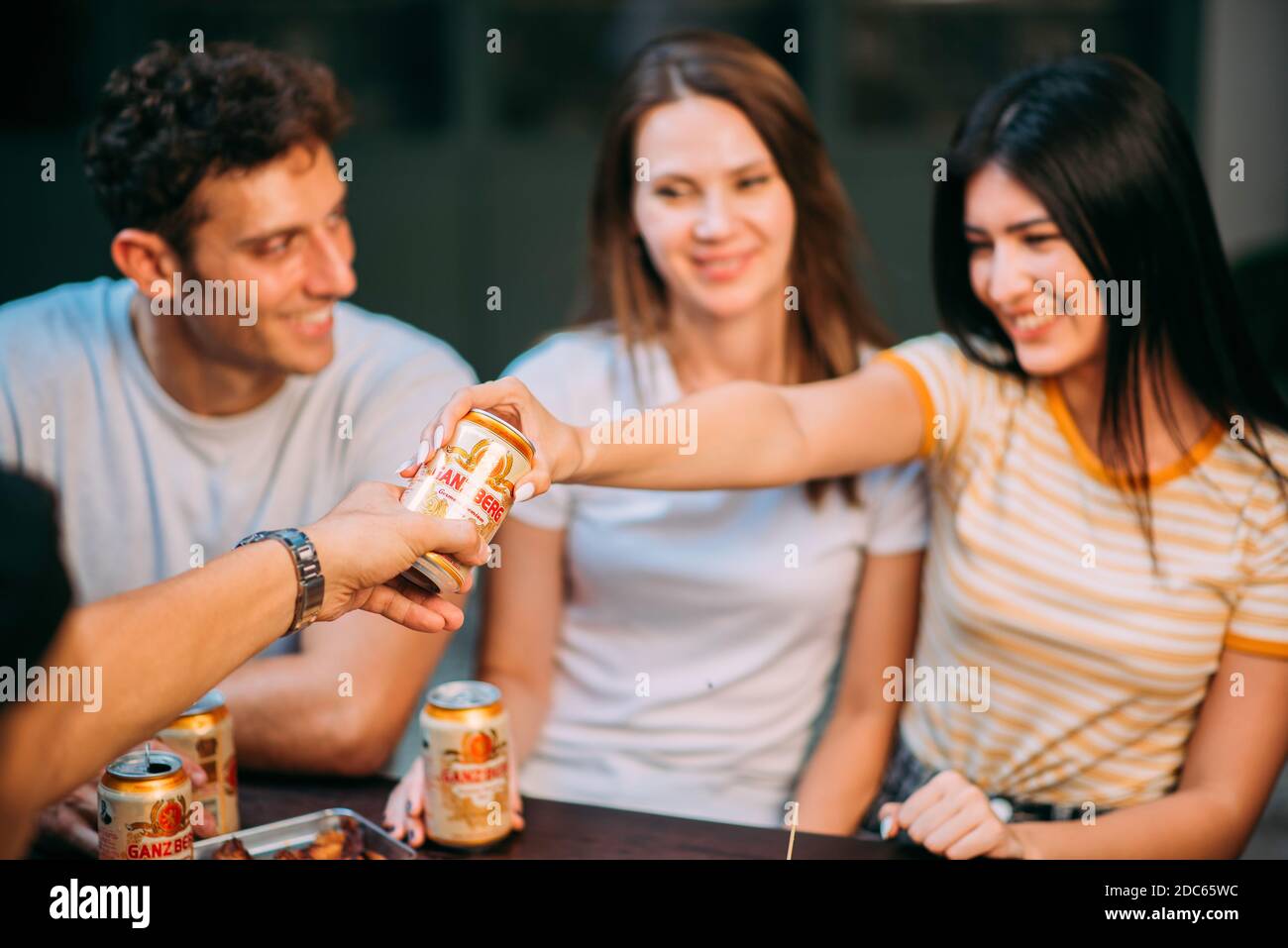 Party beer Happy friends group drinking Ganzberg beer at brewery bar ...