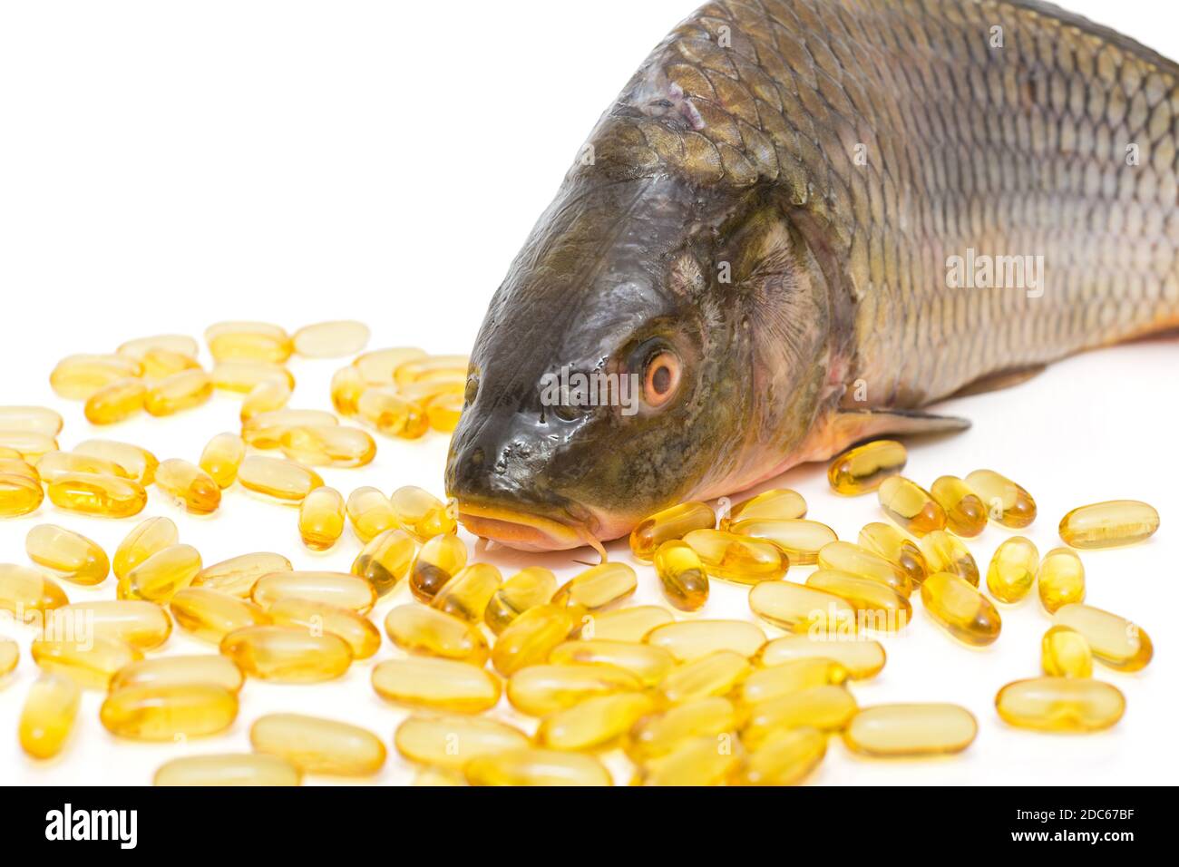 Fresh fish and omega 3 capsules isolated on a white background Stock ...