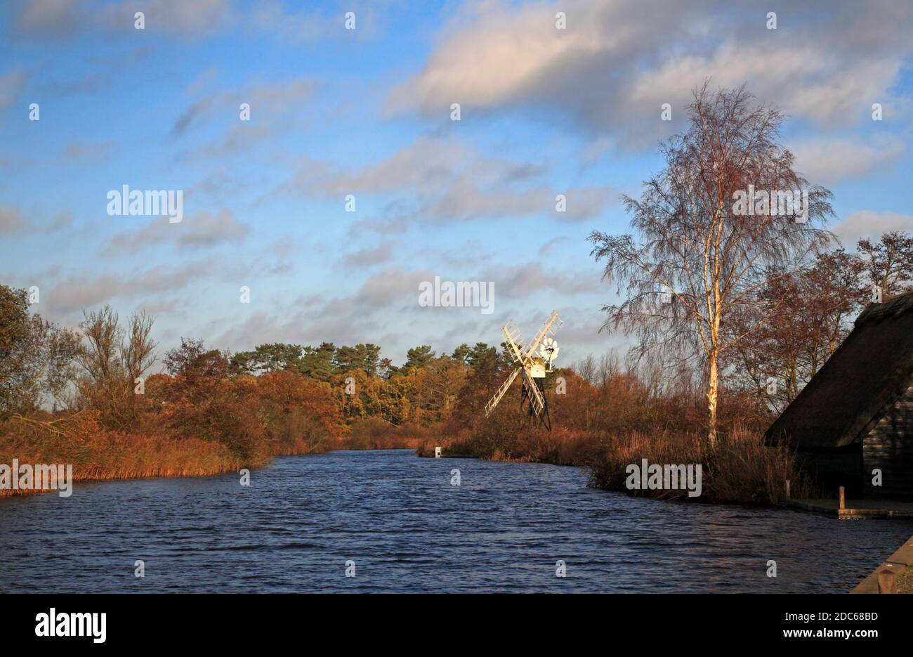 A view of the River Ant at How Hill Staithe on the Norfolk Broads at ...