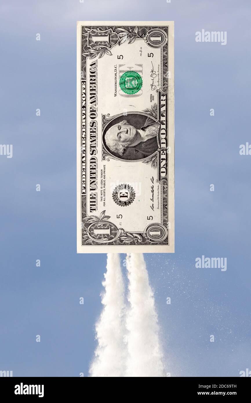 a dollar flying into the sky Stock Photo - Alamy