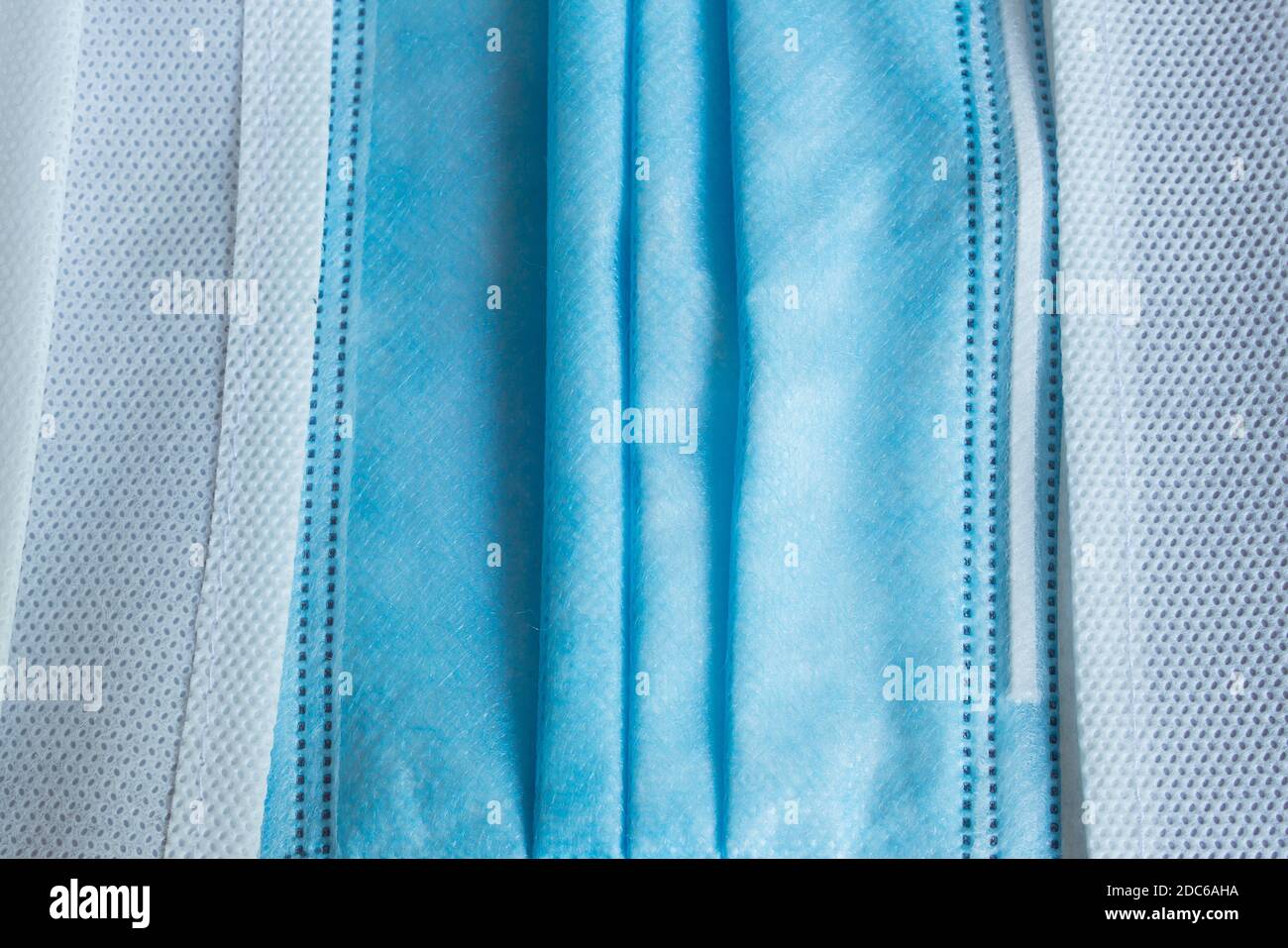 A close up of facial masks or surgical masks. COVID-19 disease ...