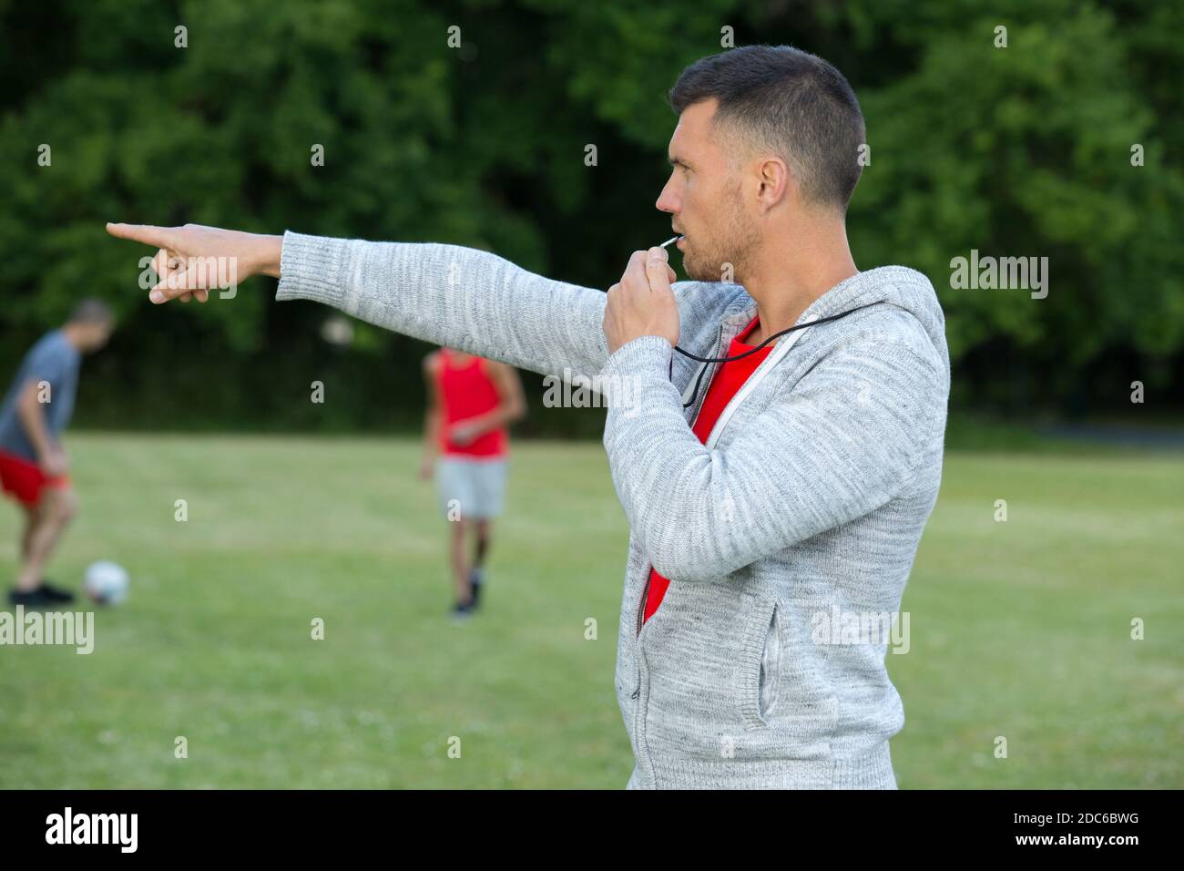 a referee on football field Stock Photo - Alamy