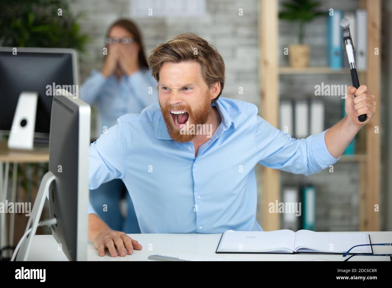 entrepreneur angry and furious with computer Stock Photo - Alamy