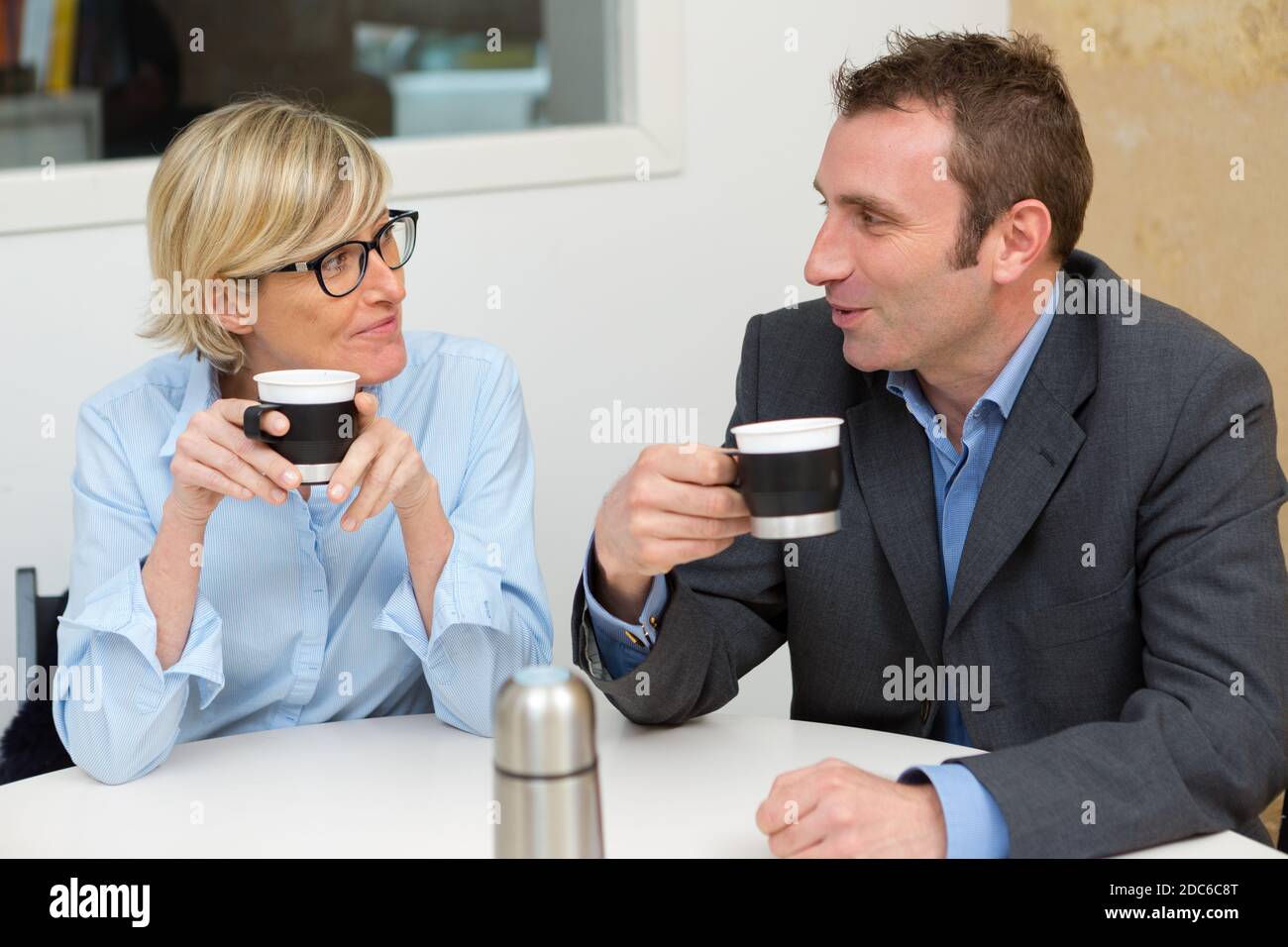 happy work team during break time in office Stock Photo - Alamy