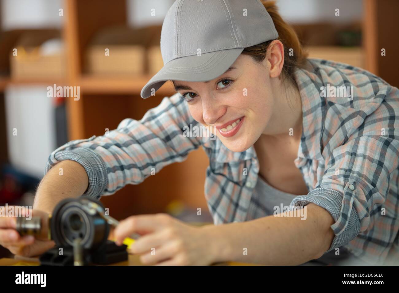 happy female worker during work Stock Photo - Alamy