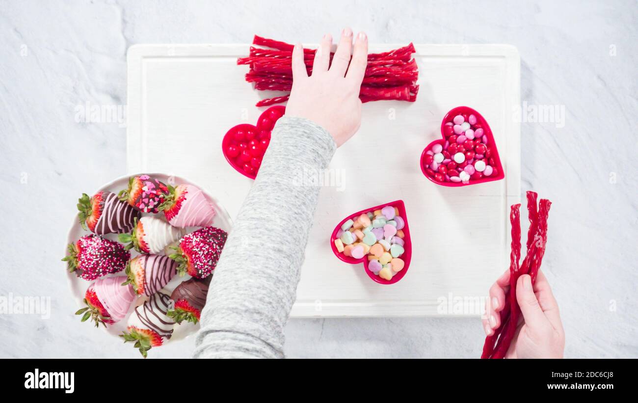 Flat lay. Step by step. Cheese board with candies and cookies for ...