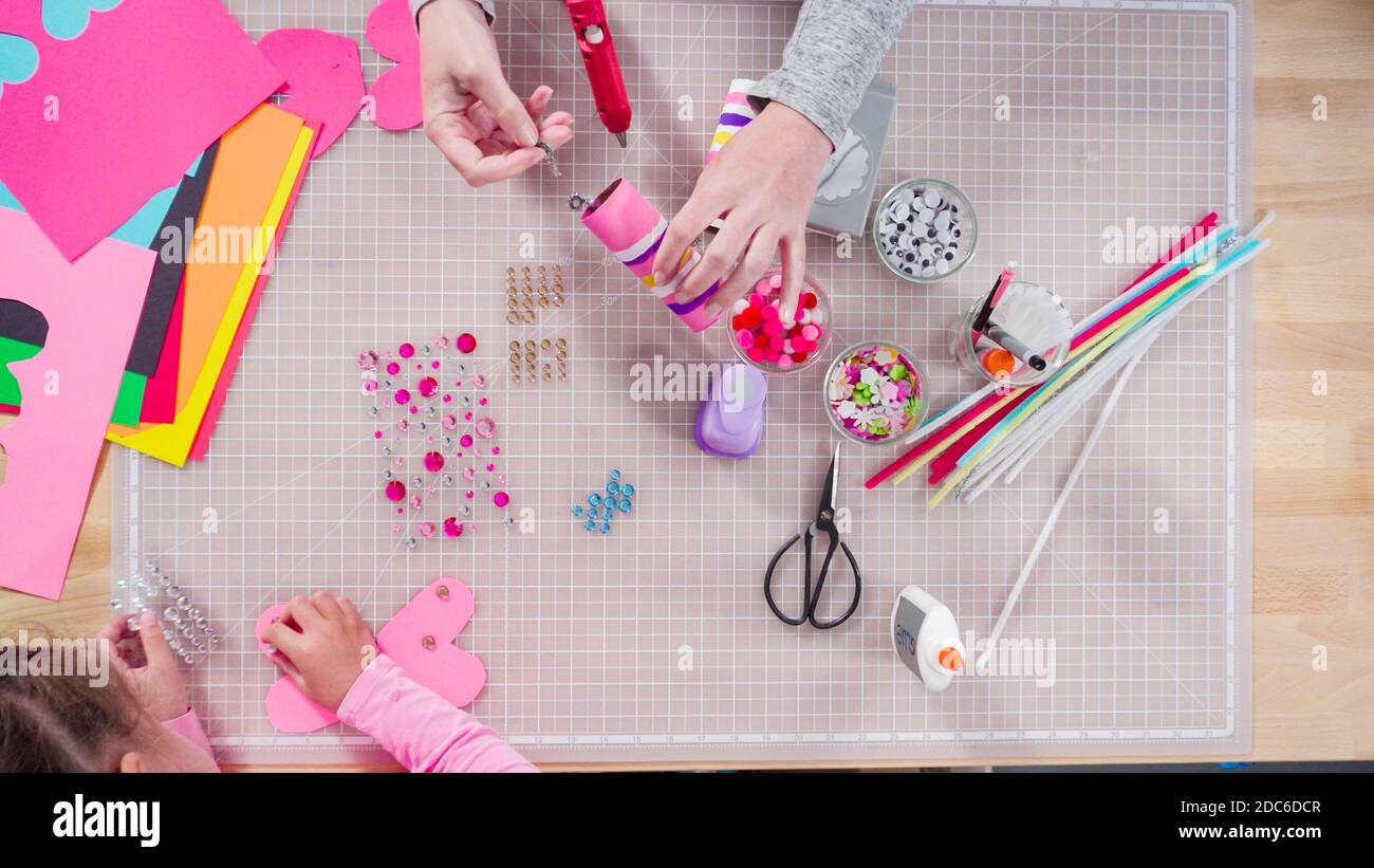 Flat lay. Kids papercraft. Making paper bugs out of the empty toilet ...