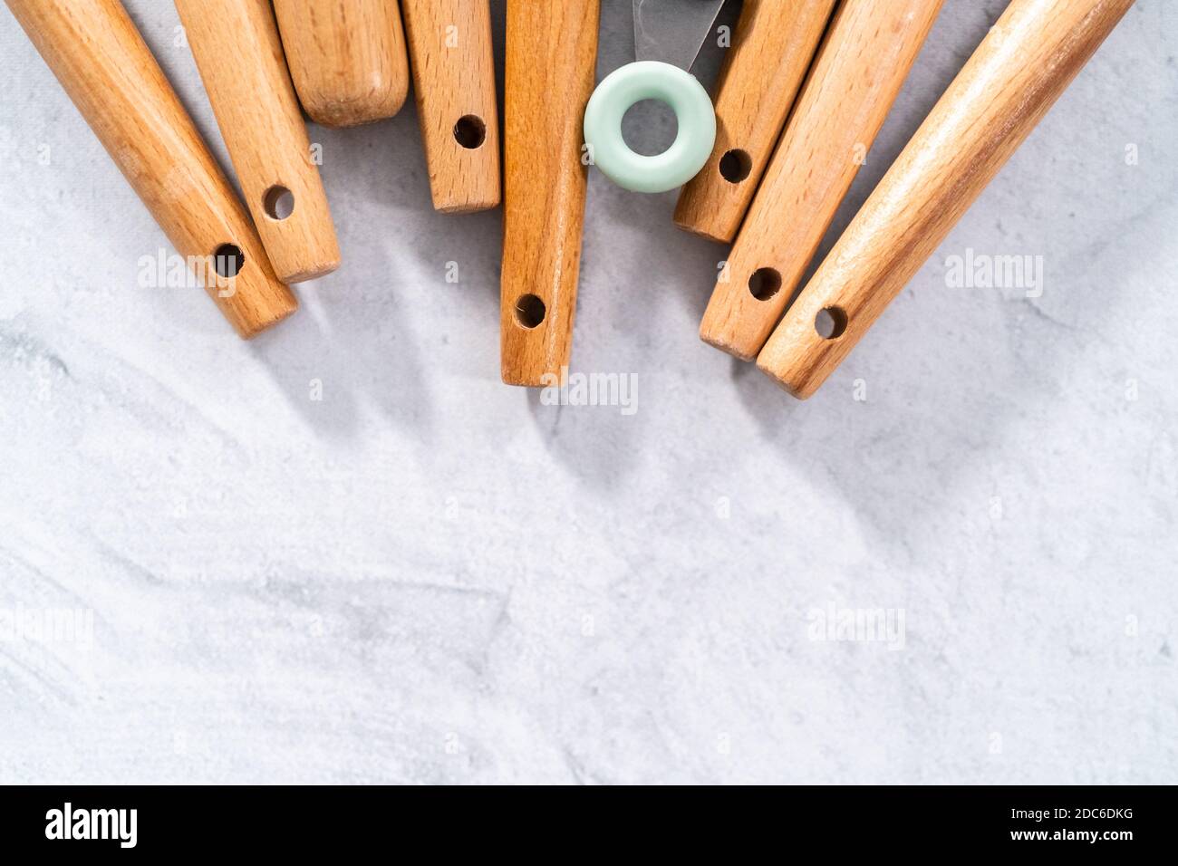 Silicone cooking utensils with wooden handle Stock Photo - Alamy