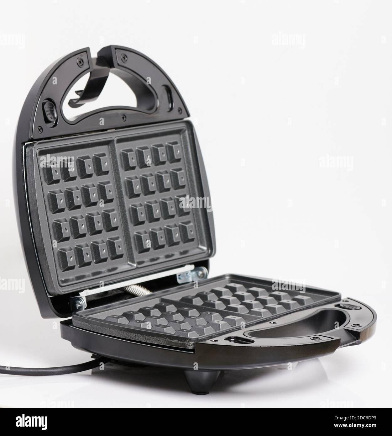 Modern waffle maker machine side view isolated on white background ...