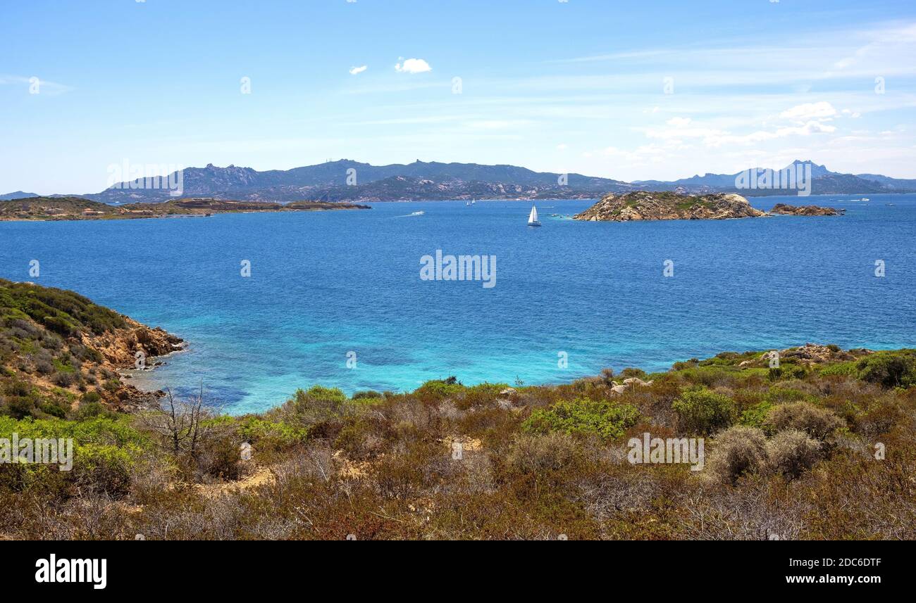 Panoramic view of Caprera Island and Spiaggia di Cala Portese harbor at ...