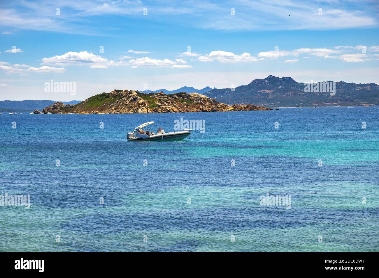Panoramic view of Caprera Island and Spiaggia di Cala Portese harbor at ...