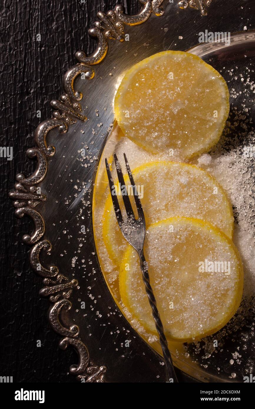 Lemon pieces on table cut hi-res stock photography and images - Alamy