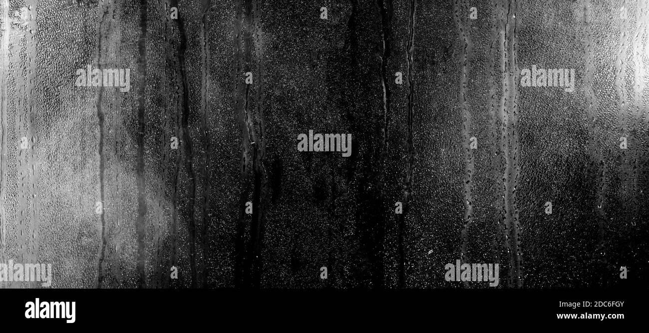 Drops of water on red and black surface Black and White Stock Photos ...