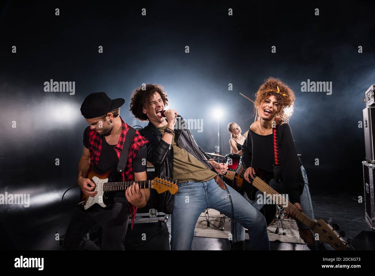 Female vocalist leaning microphone drummer hi-res stock photography and ...