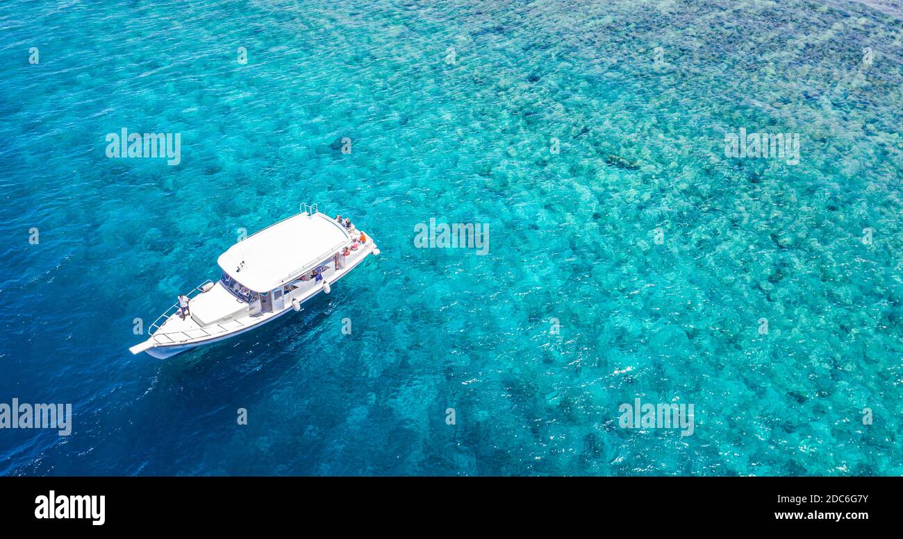 Aerial view of tropical island coast, shoreline beach. Summer holiday ...
