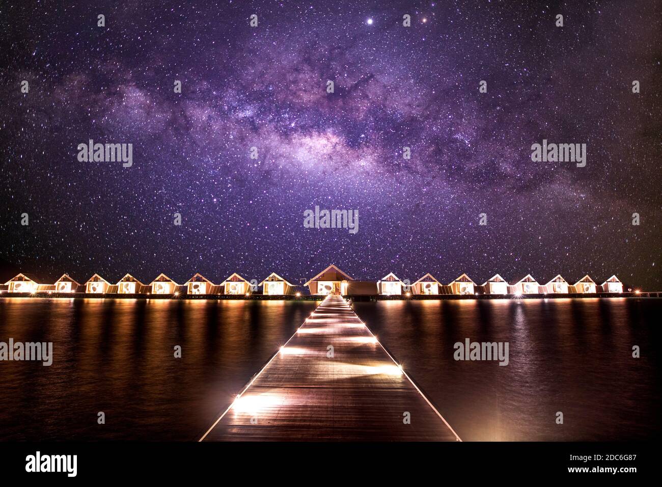 Amazing night landscape, led lights with jetty and over water villas ...