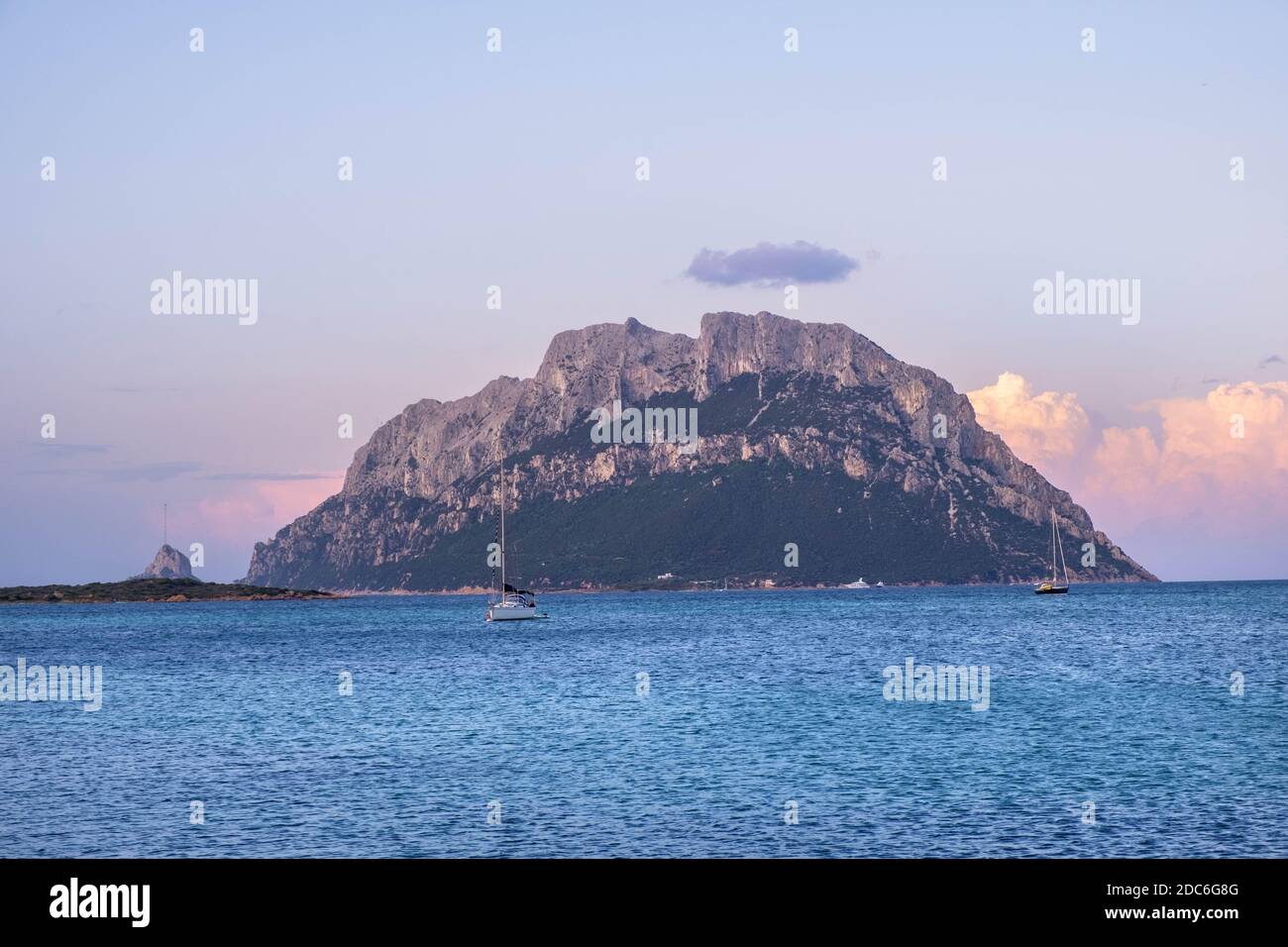 Tavolara, Sardinia / Italy - 2019/07/18: Evening view of main limestone ...