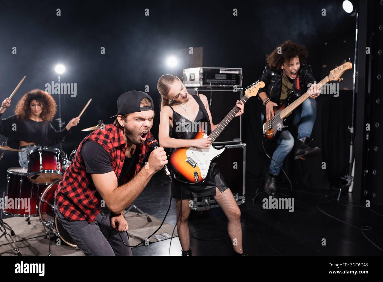 Guitarist jumping in band hi-res stock photography and images - Alamy