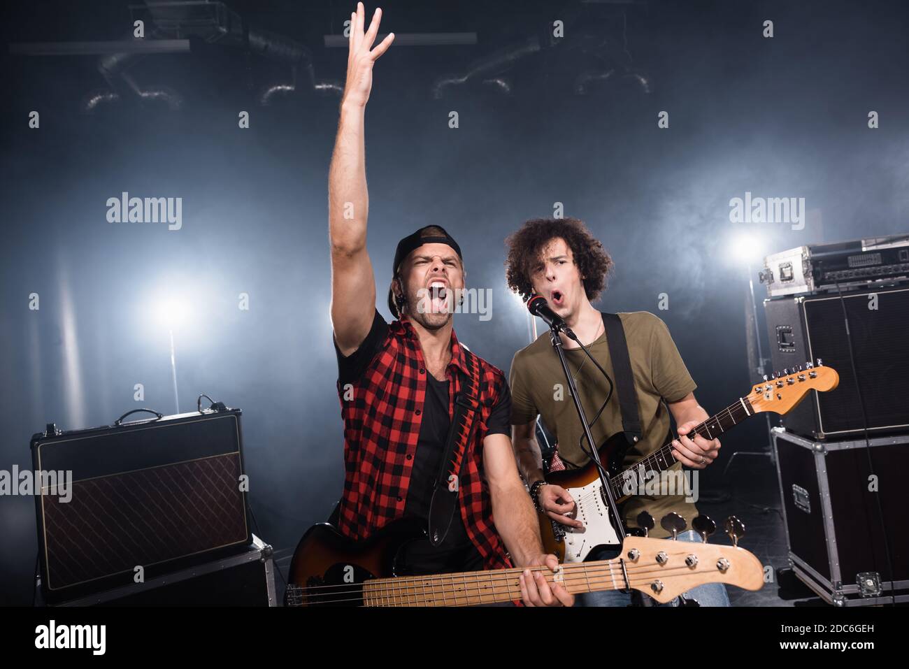 KYIV, UKRAINE - AUGUST 25, 2020: Rock band musicians shouting while ...